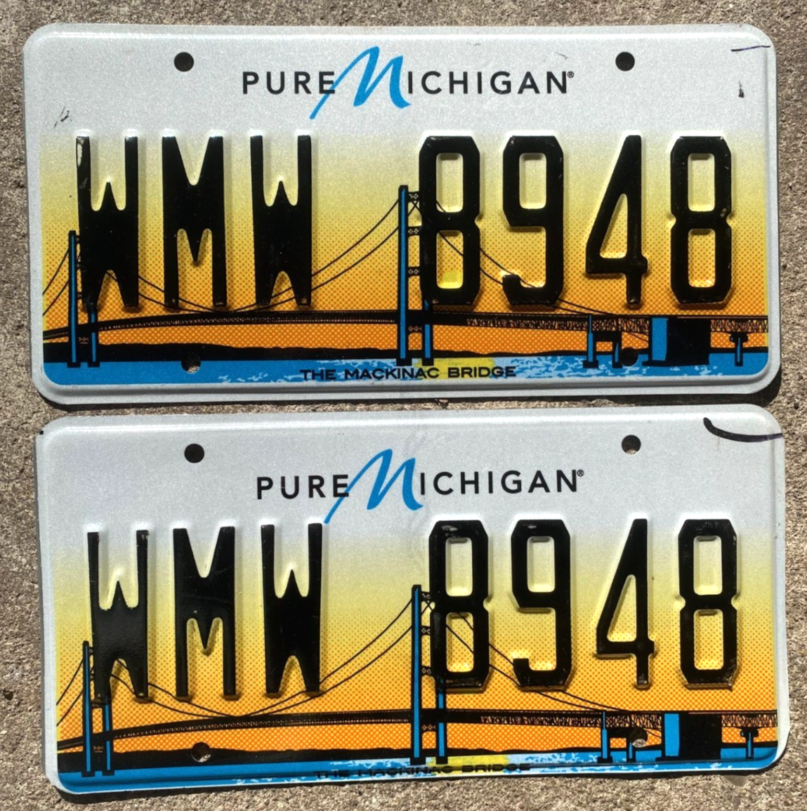 Oddball pair of expired MICHIGAN bridge license plate plates # WMN ...