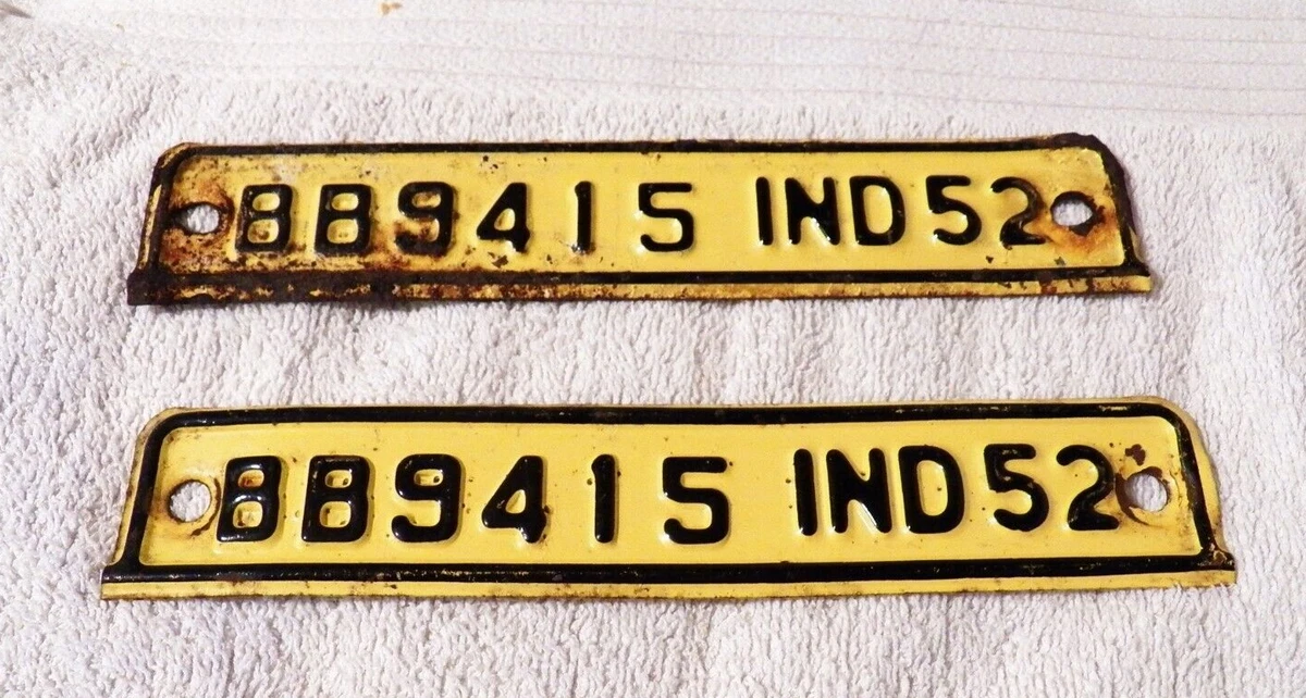 Vintage Auto Art: Uncovering the Beauty of Old License Plate Toppers