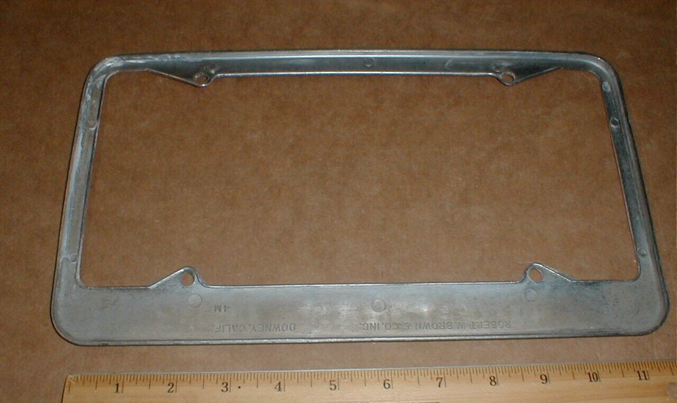 Reno Excalibur West vtg Metal License Plate car tag frame NV Nevada or ...