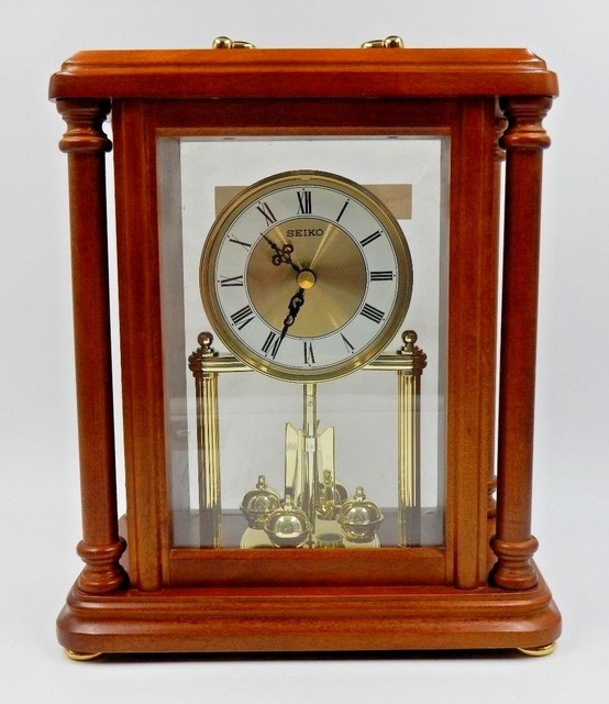 Seiko Wooden Mantel Clock With Rotating Pendulum QXG332BLH Battery ...