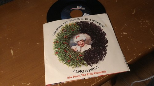 ELMO N PATSY GRANDMA GOT RUN OVER BY A REINDEER / PERCY TINY POINSETTIA ...