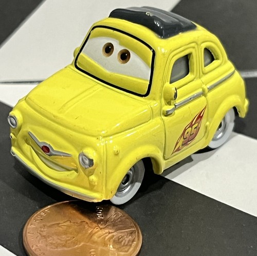 Disney Pixar Cars toy Retired Die cast Luigi Yellow Fiat 95 World Grand ...