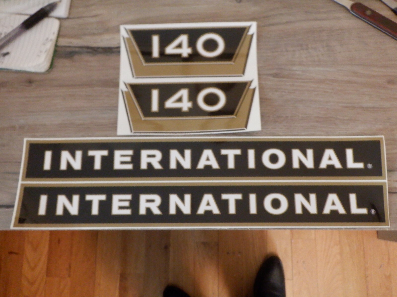 INTERNATIONAL 140 DECALS. HOOD & NUMBERS ONLY. BLACK & GOLD. C-DETAIL ...