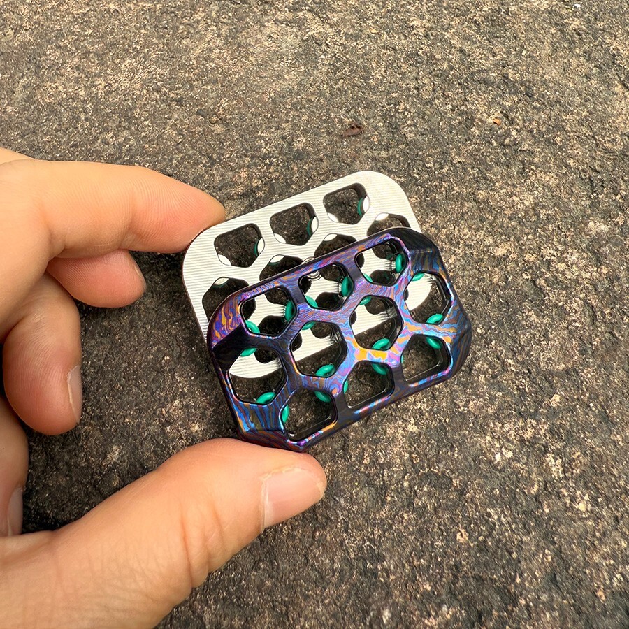 New design Hex skeleton Titanium alloy unlimited haptic fidget slider ...