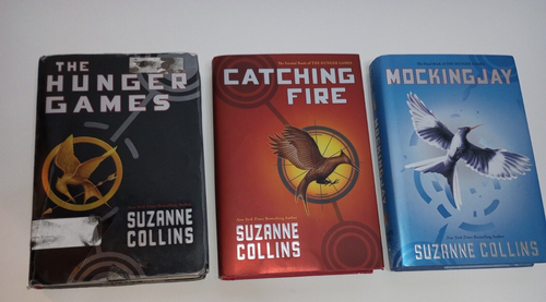 3 hardcover books The Hunger Games, Catching Fire and Mockingjay ...