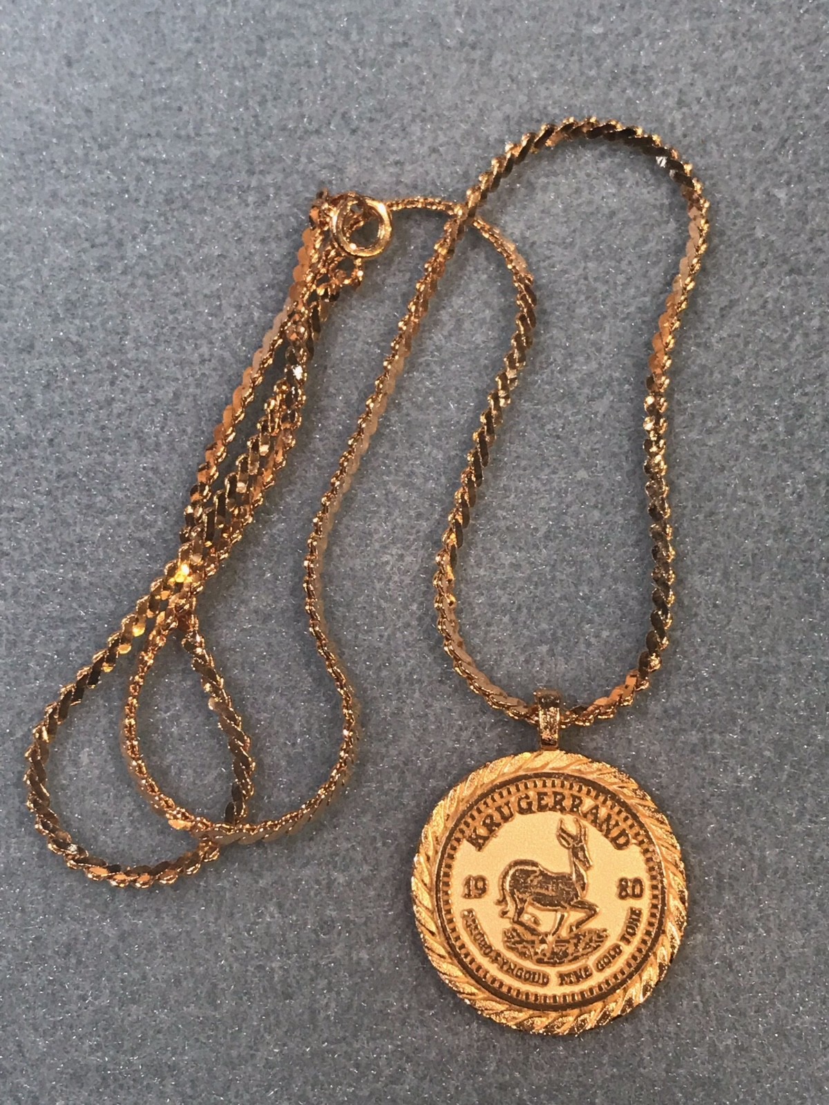 Krugerrand medallion on chain, 1970s shiny gold plated - Gem