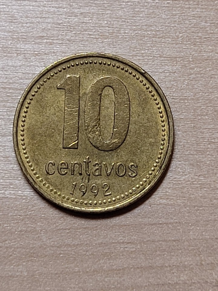 Argentina 10 centavos coin, 1992. KM# 107, aluminum-bronze. Smiling sun ...