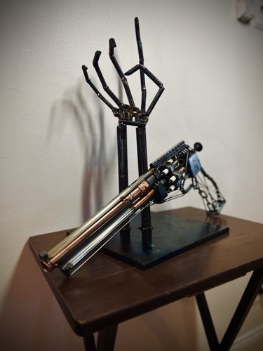 Welded Metal Art Sculpture Revolver Gun Pistol With Steel Skeleton Hand ...