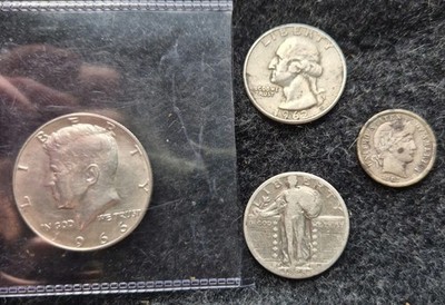 $1.10 Face Value US Silver Coin Lot. 1966 50c, 1962 25c, 1928 25c, 1907 ...
