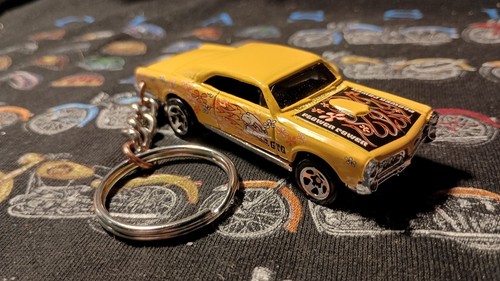 1967 Pontiac GTO keychain, gloss yellow W/chrome mags,good condition ...