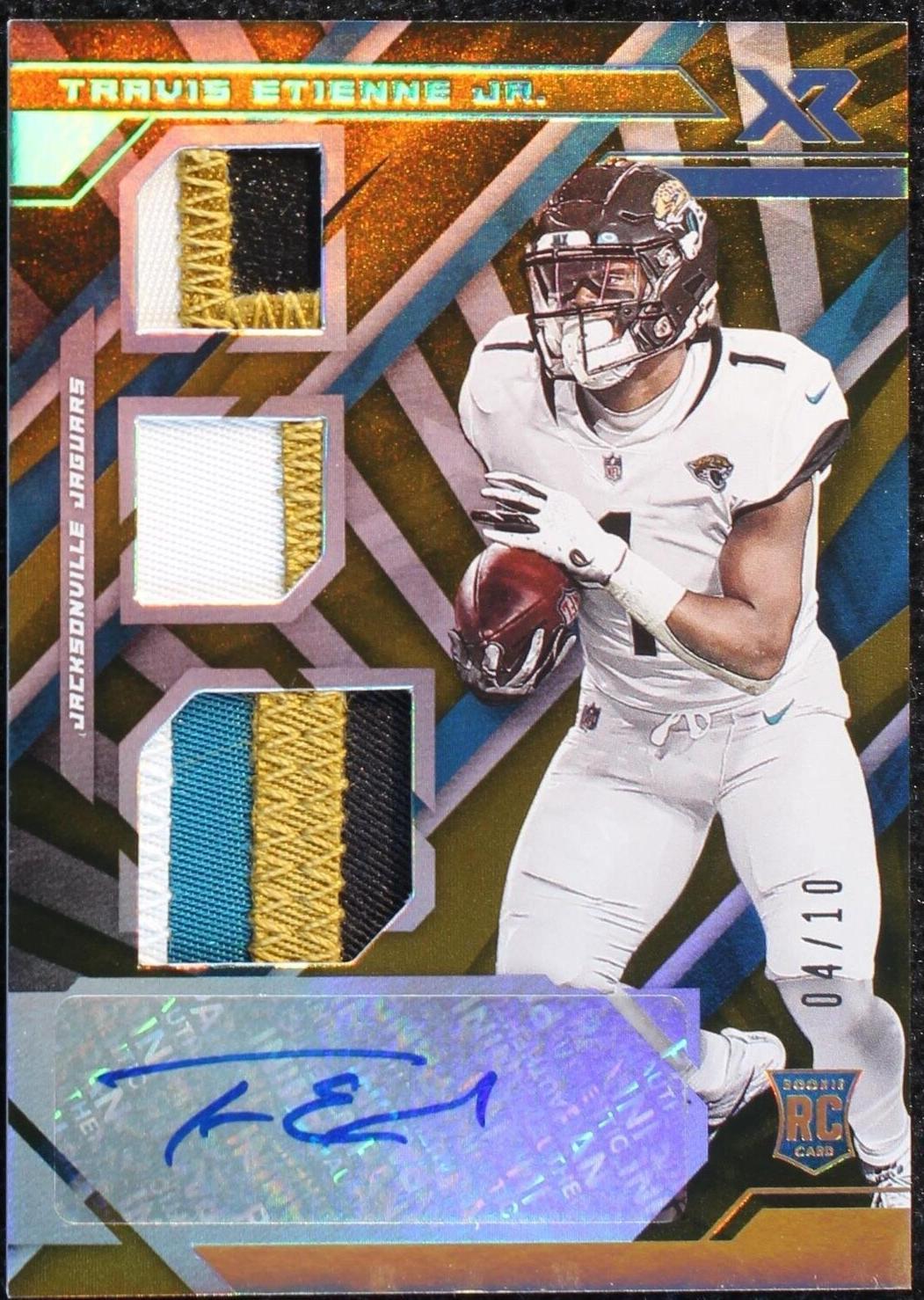 2021 Panini XR - Rookie Triple Swatch Autographs Travis Etienne #212 ...