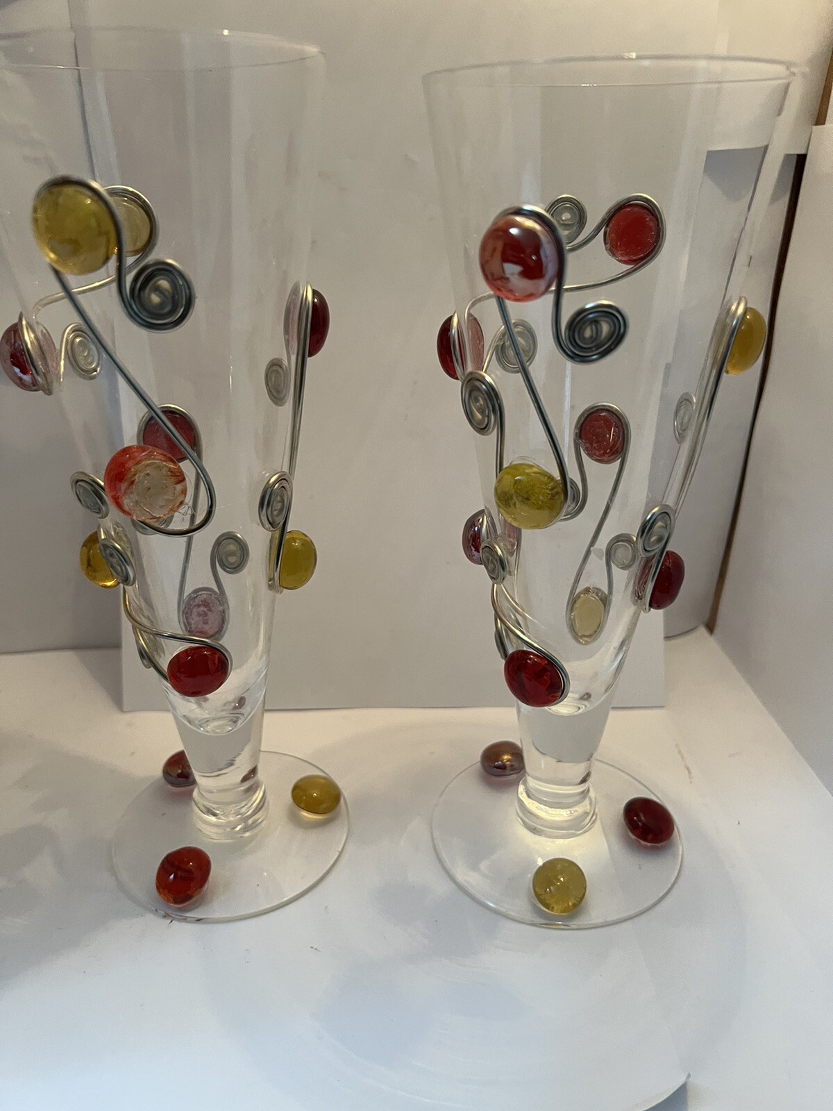 designer set of champagne flutes with silver scrolls and colorful glass ...