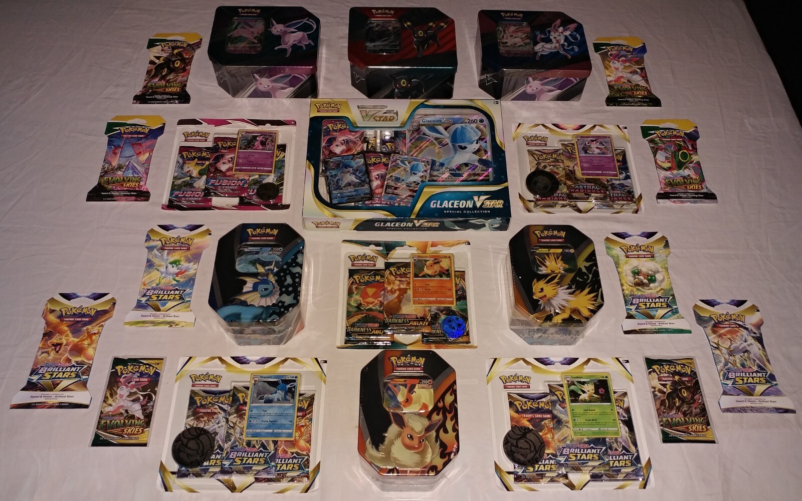 57 Pokemon Packs 🤗Tins - 3 Pack Blister Packs - 14 Evolving Skies Packs ...