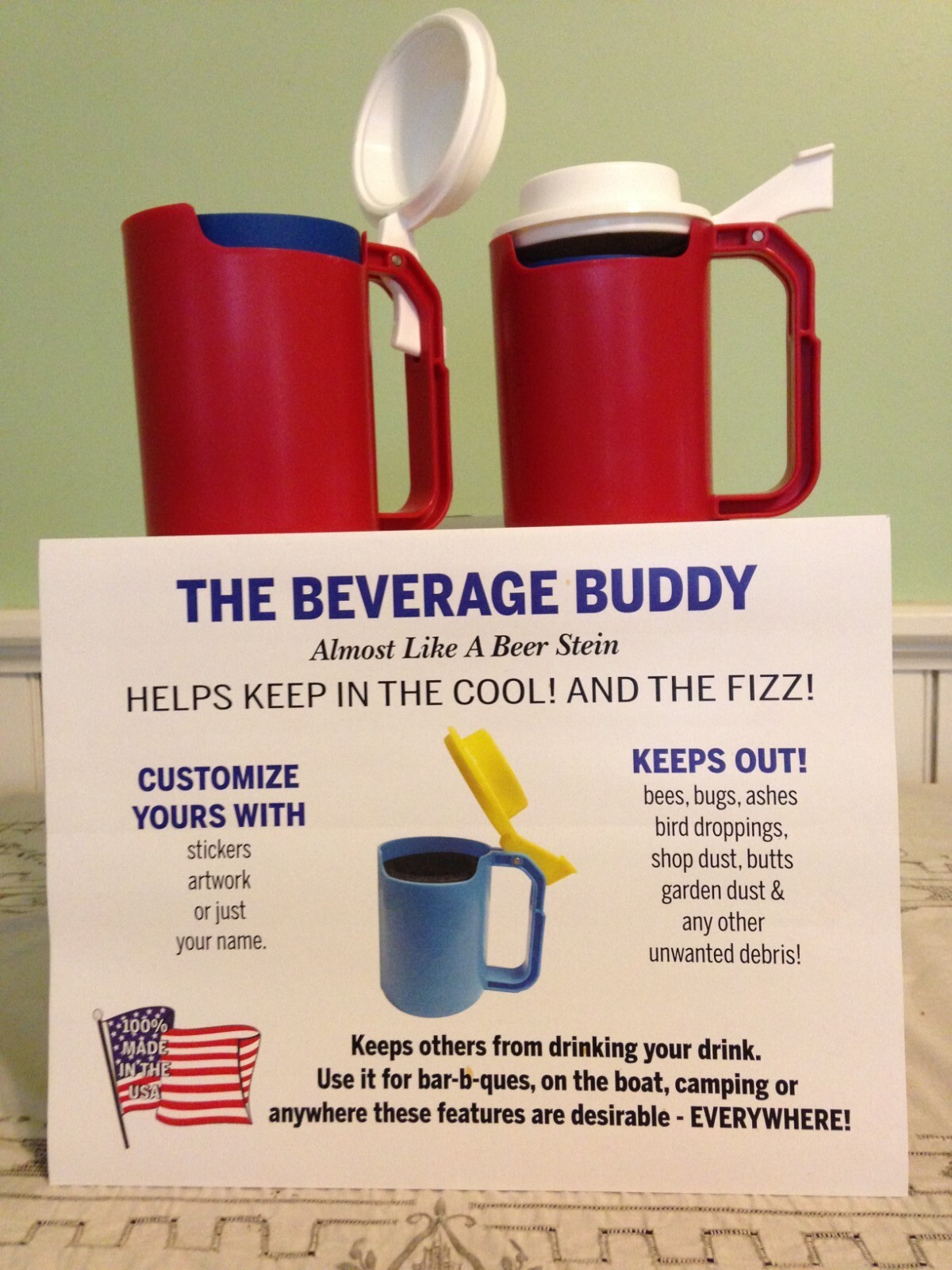 plastic beverage can holder withflip top lid and cooziie. Keeps cans ...