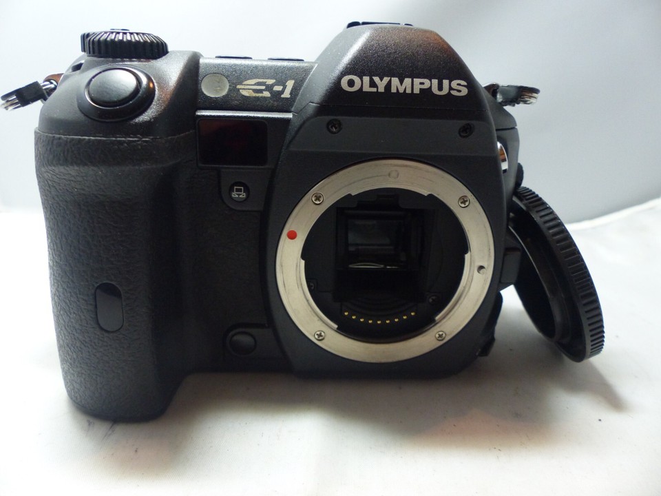Olympus E1 With Zuiko 70-300mm zoom. Comes with the grip. Shutter count ...