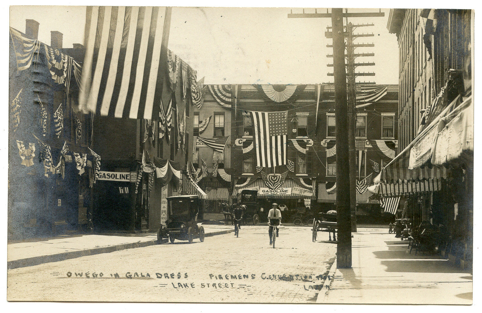 RPPC NY Owego Lake St in Gala Dress Firemens Convention Flags Gasoline ...