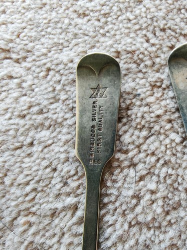 Three antique spoons are marked First Quality Silver with a Star Of ...
