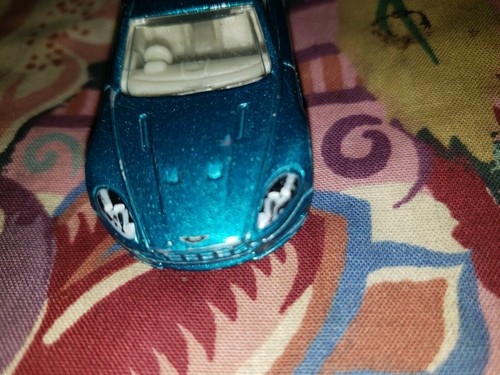 2010 MATTEL HOTWHEELS BLUE ASTON MARTIN CAR R6459 | eBay