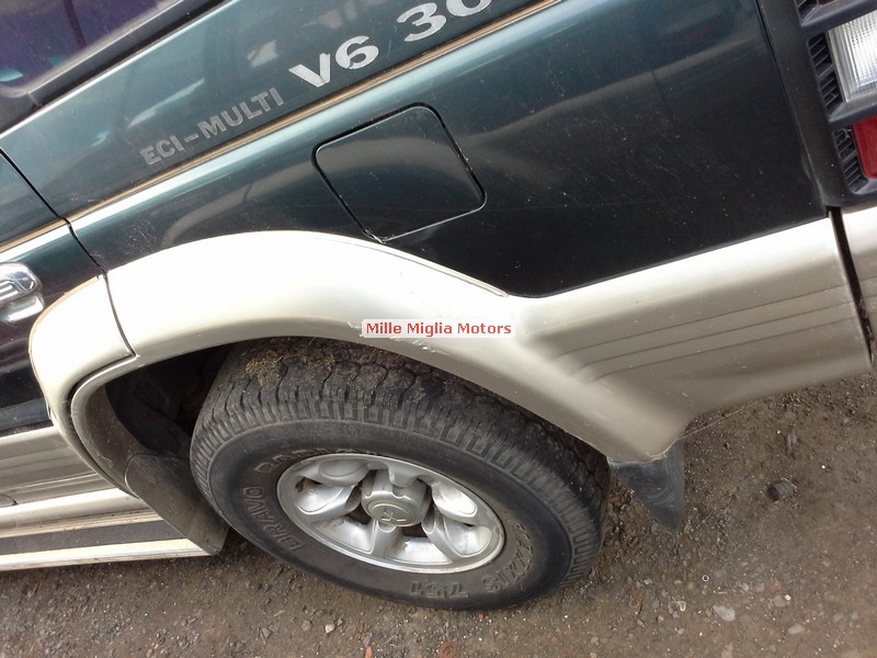 Mitsubishi Pajero rear wheel arch body part covet passenger side | eBay ...
