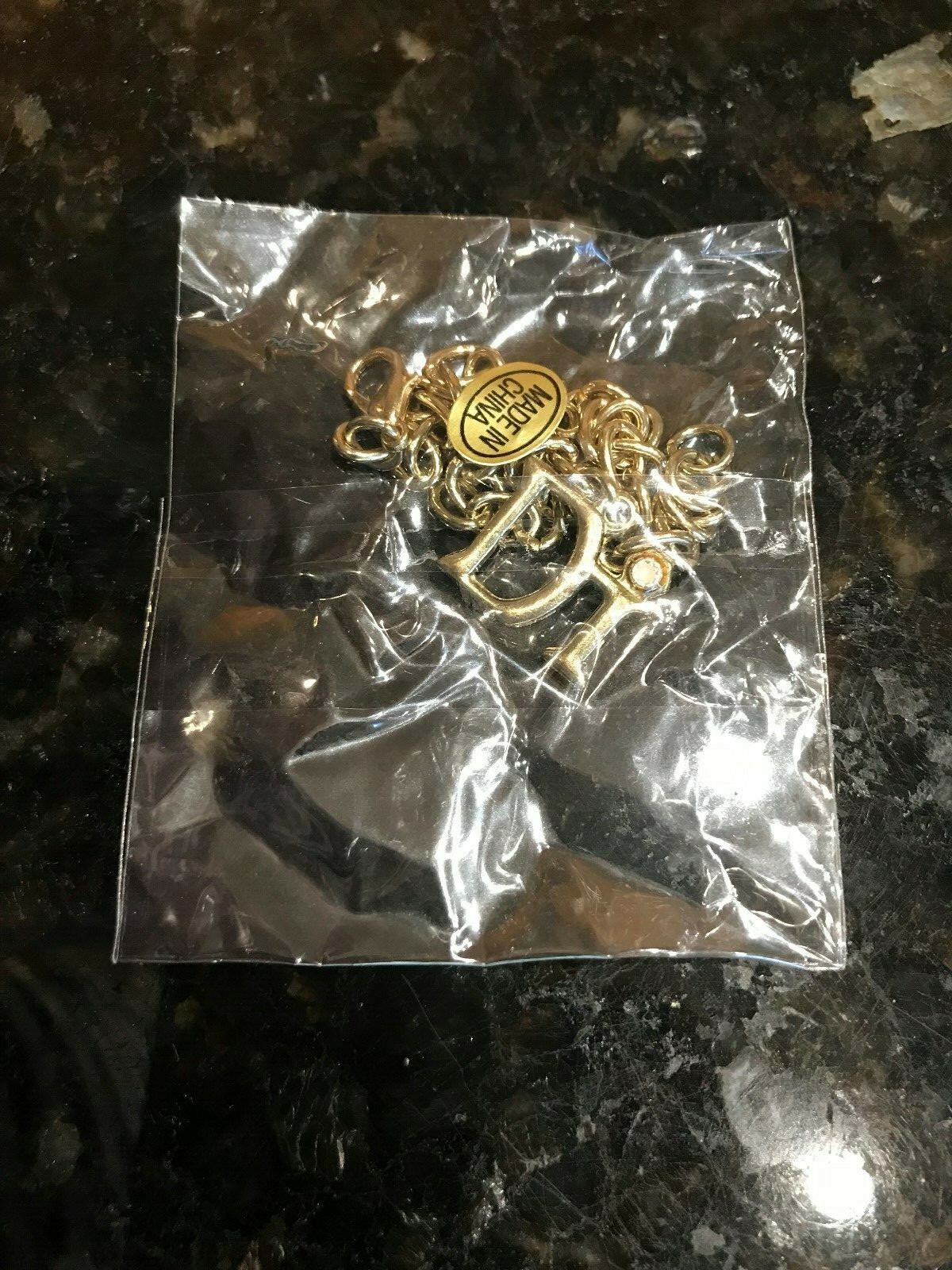 NEW Diamonds International charm bracelet gold with DI charm white ...