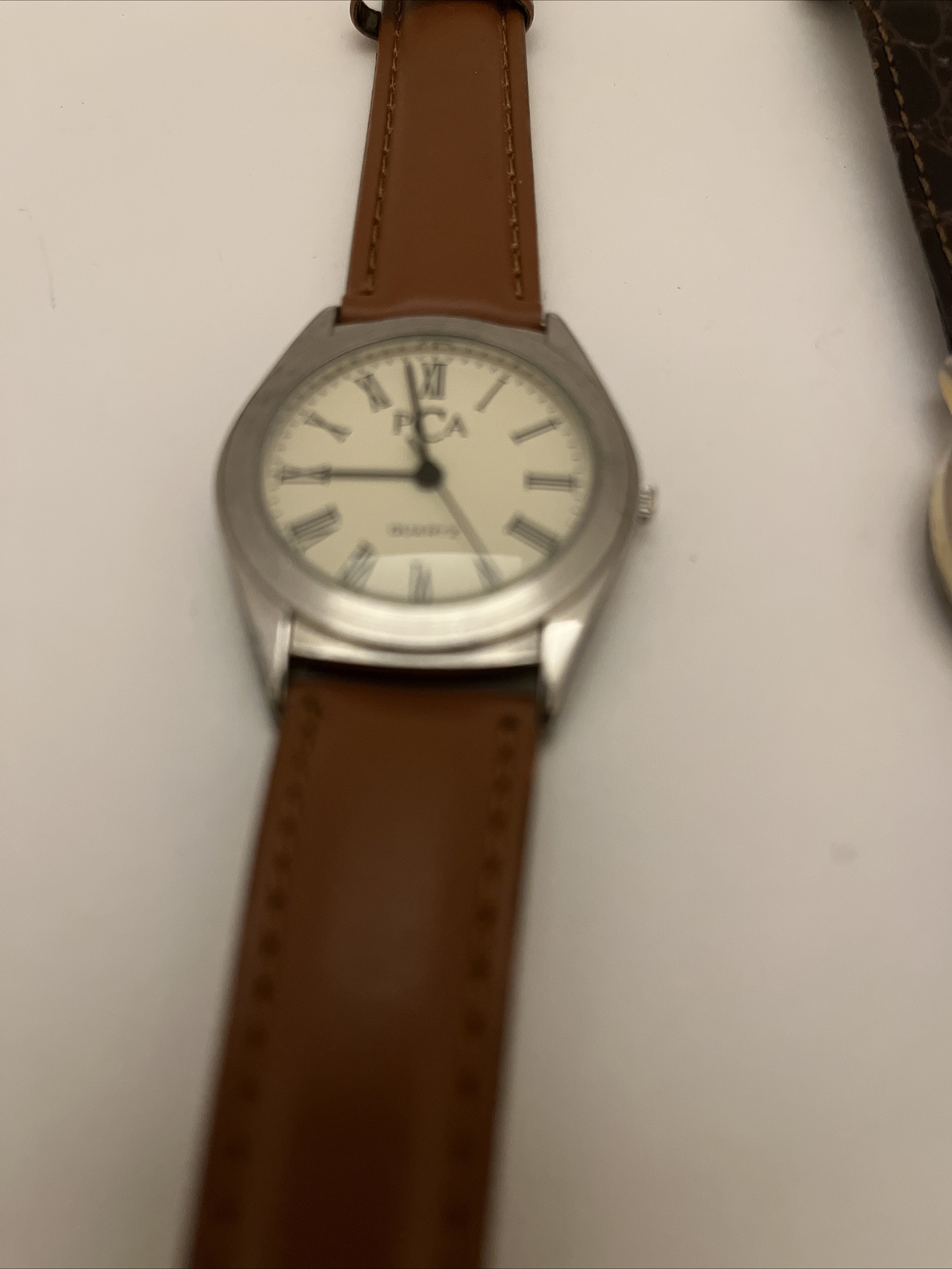 Lot of 2 men watches, 1 PCA Quartz and a Rare Golf 3D moving ball Swiss ...