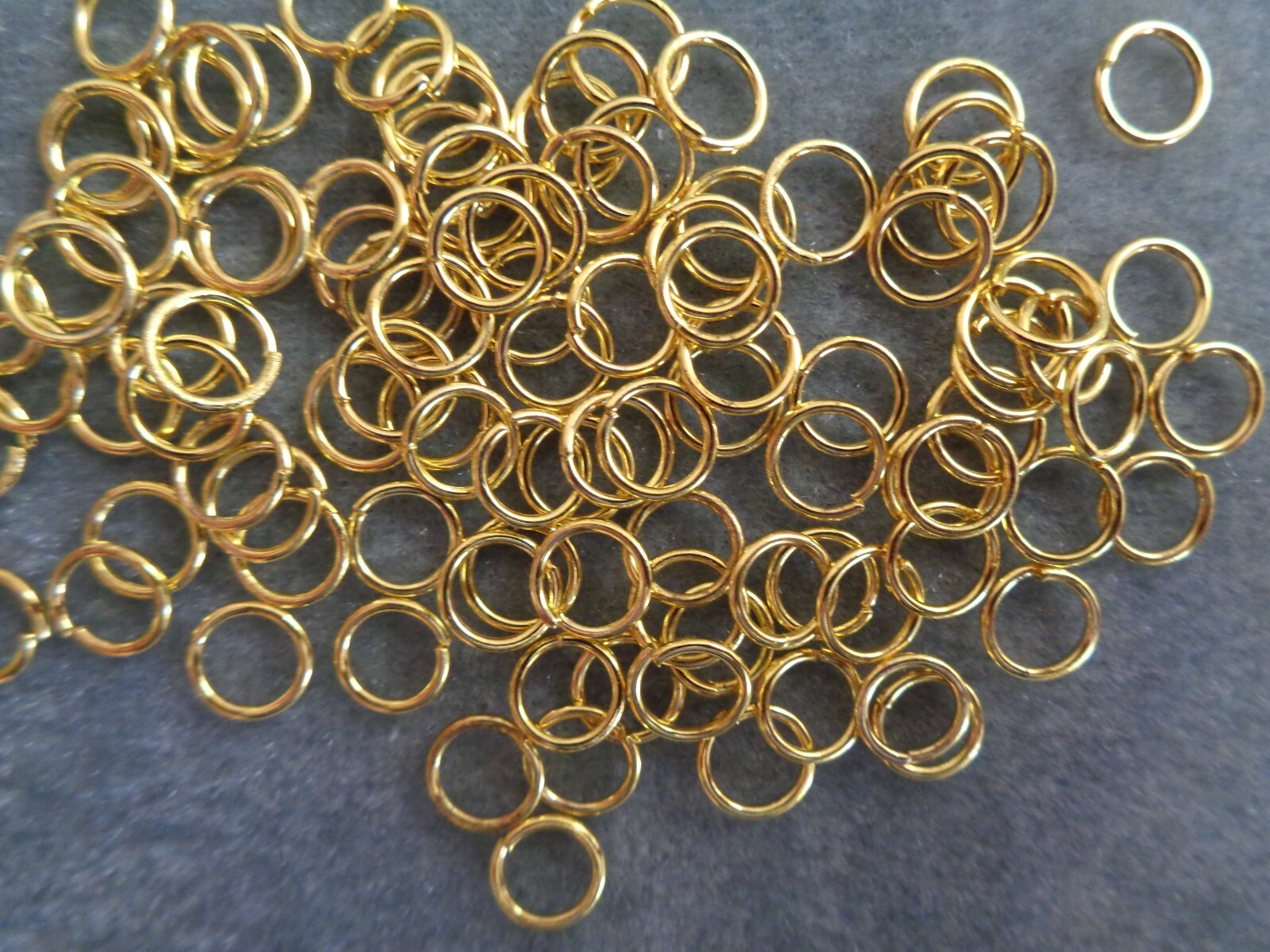 Split ring, gold-finished steel, 8mm round. Sold per pkg of 100. | eBay