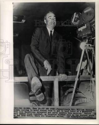 1964 Press Photo Governor William Scranton climbs railing enroute to ...