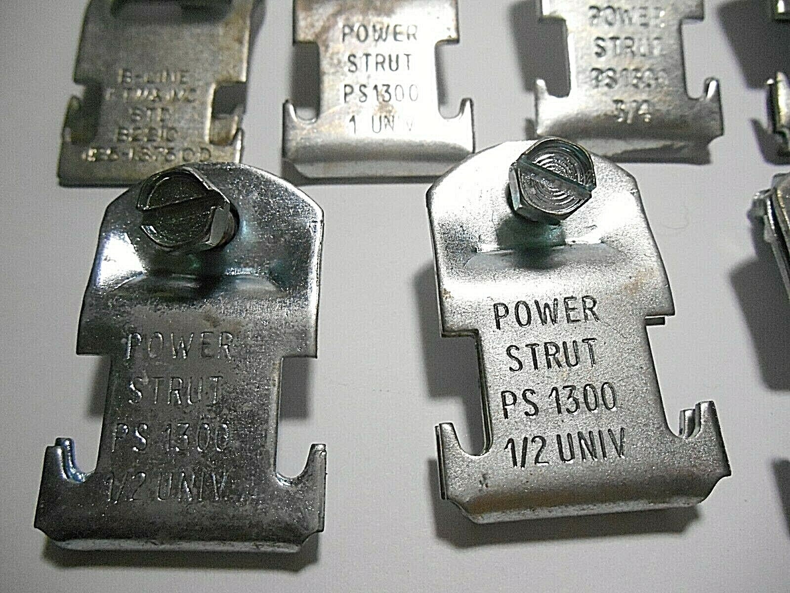 LOT OF 13 ASSORTED POWER STRUT CONDUIT CLAMP STRUT STRAPS 1/2" UNIV. 3/ ...