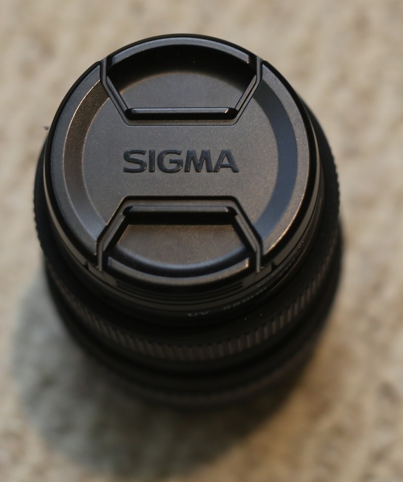 SIGMA 55-200MM F/4-5.6 DC IN CANON EF MOUNT W CAPS AND FILTER CLEAN ...
