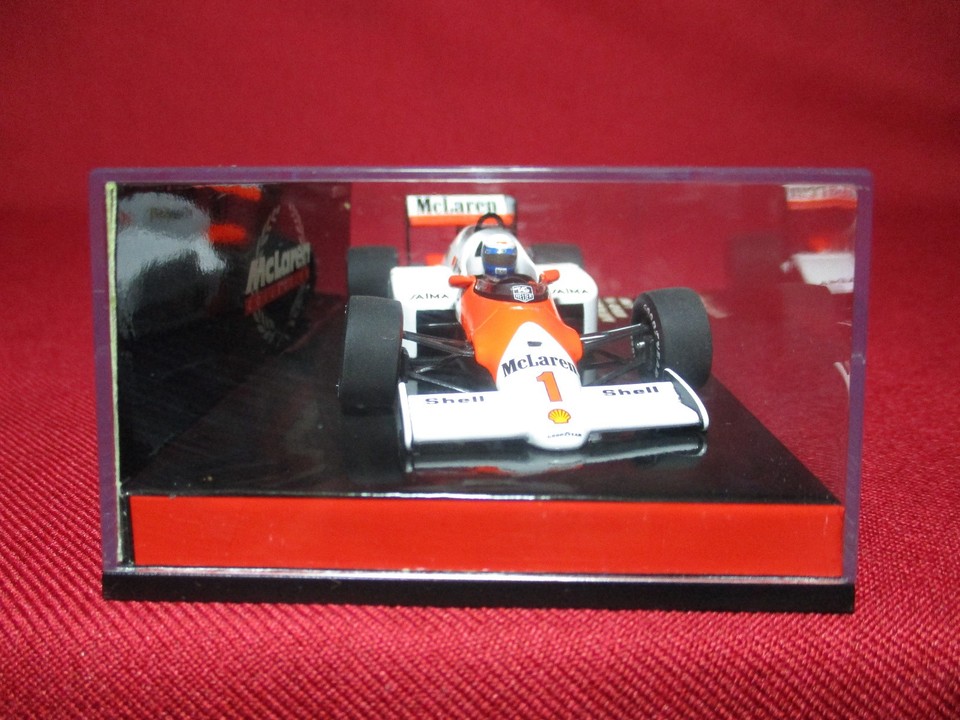 1:43 Scale Alain Prost 1986 McLaren TAG MP4/2C British GP Minichamps ...