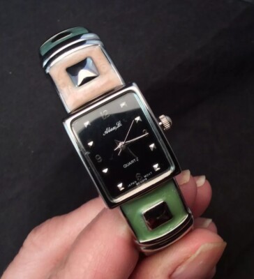 Alex L. Quartz Watch With Silver Tone Multi Color Hinged Bangle Band ...