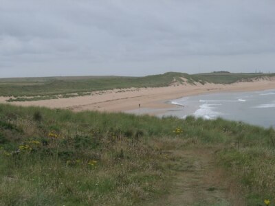 Photo 6x4 Craigewan beach Peterhead/NK1346 The guy standing on the ...
