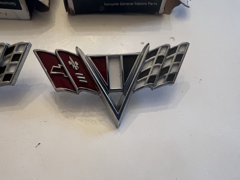 Nos gm pair Of 1964-67 Chevelle Nova Impala Camaro Flag Fender emblem ...