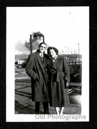 COUPLE OVERCOATS FACTORY SMOKESTACK BILLOWING SMOKE OLD/VINTAGE PHOTO ...