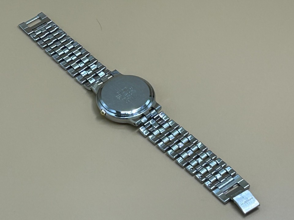 Vintage CASIO ARGENT MTW-150 Moon Ivory Roman Day-Date 33mm QZ Watch ...