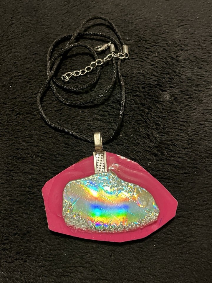 Elegant pink pendant necklace with a black cord. Perfect for any ...