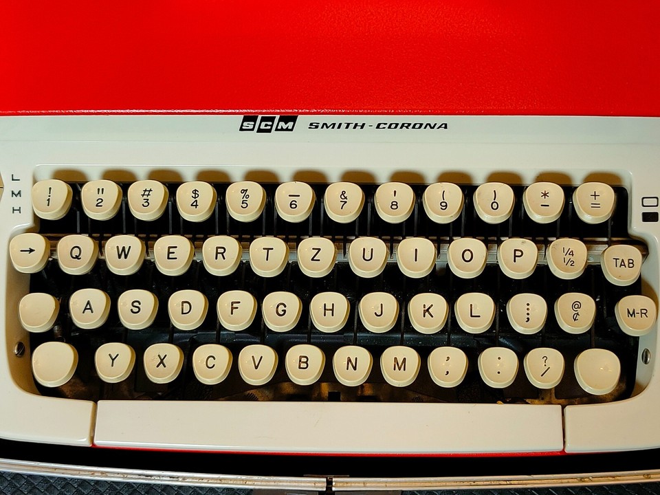 red, portable Smith Corona Galaxie typewriter with Cursive ...