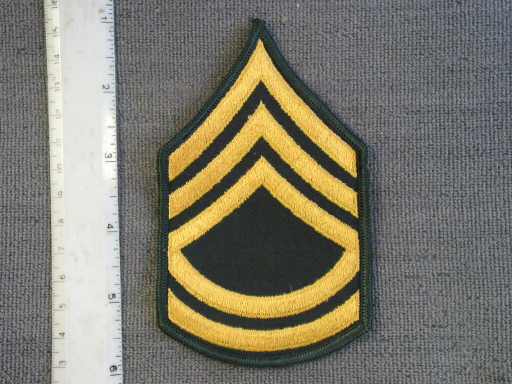1968 - 1985 U. S. Army Sergeant First Class, gold on green Chevron ...