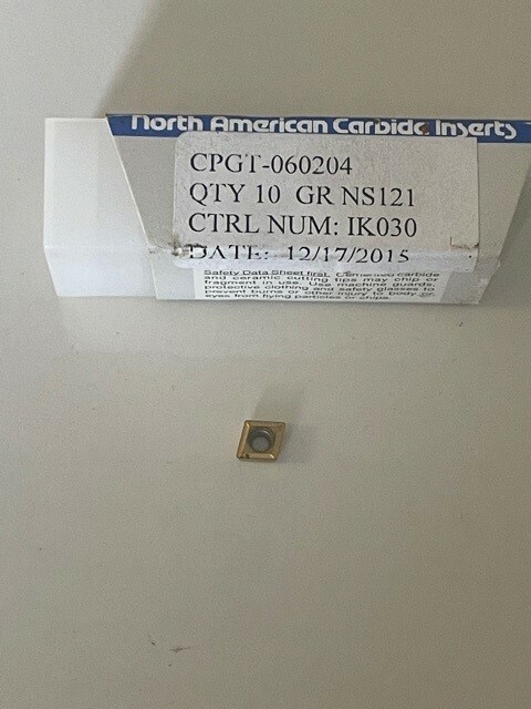 10 NEW North American Carbide inserts. CPGT 060204. GRADE NS121