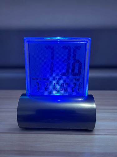 Brookstone Jimi The Clock That Rocks Lighted Motion Alarm Temperature ...