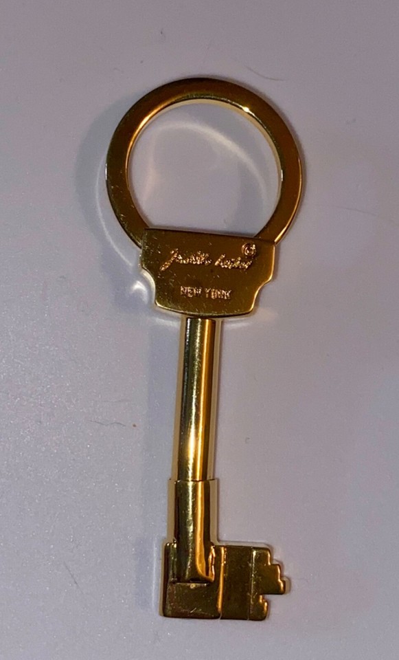 Judith Leiber Key shaped gold tone key chain w Brownish Red Gem | eBay