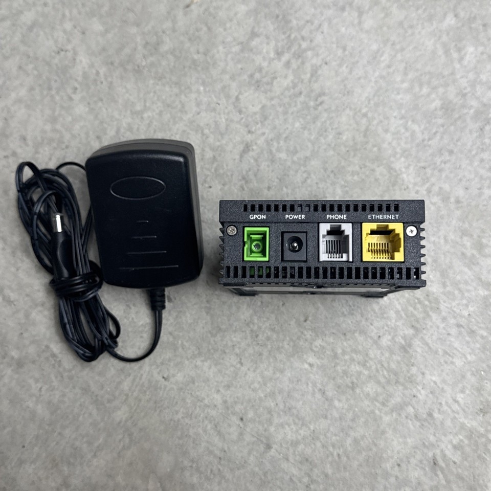 Calix 100-04255 GigaPoint 803G Fiber ONT Modem w/ Power Supply | eBay