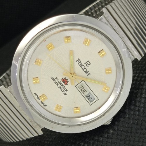 OLD RICOH AUTOMATIC JAPAN MENS OVAL SHAPE SILVER DIAL WATCH 587f ...