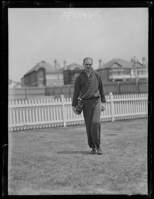 Athlete Dr Otto Peltzer of Germany walking across an athletics fie- Old ...