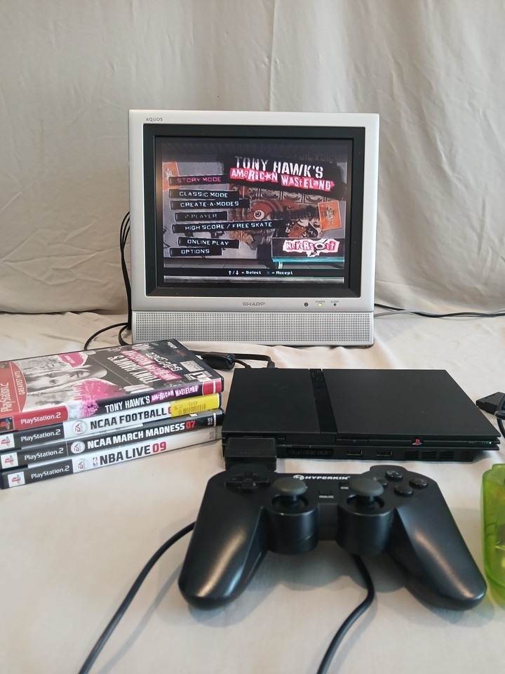 Playstation 2 Slim Console Bundle with controllers, cables, and games ...