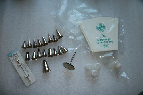 Lot - Wilton Cake Decorating Tools - Nozzles, Couplers, Bags, Flower ...
