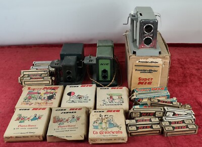JEU DE 3 PROJECTEURS NIK. COMPREND 64 FILMS. NIC ET SUPER NIC. ANNEES ...