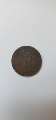 RARE 2009 Penny with guy sitting on the back on a log reading a book ...