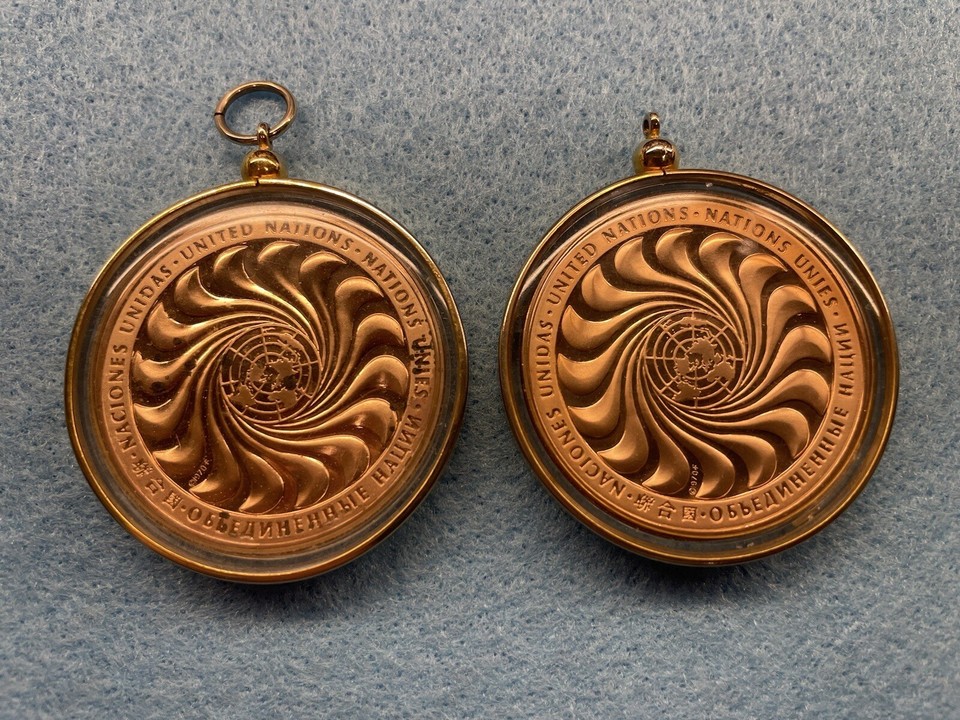 Two Pretty Medals for United Nations Youth for Peace; One has dark ...