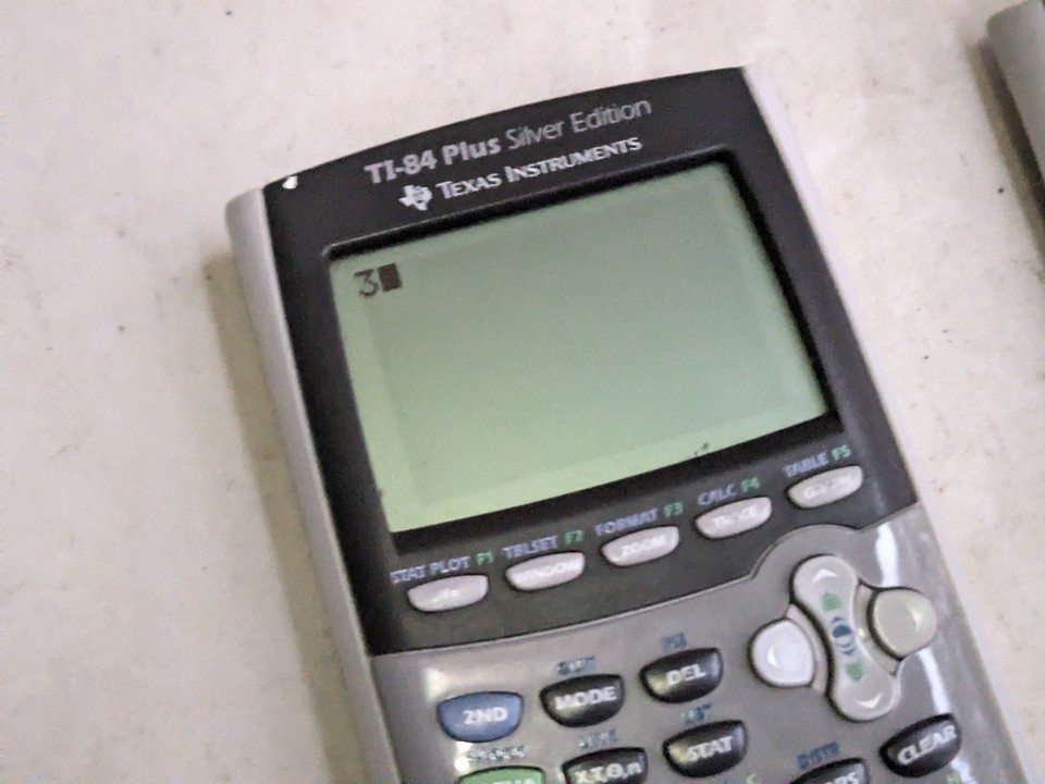 Texas Instruments TI-84 Plus Silver Edition, Graphing Calculator ...